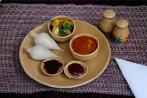 Yomari- delicious Newari food - at restaurent-cafe- Wonders of Nepal